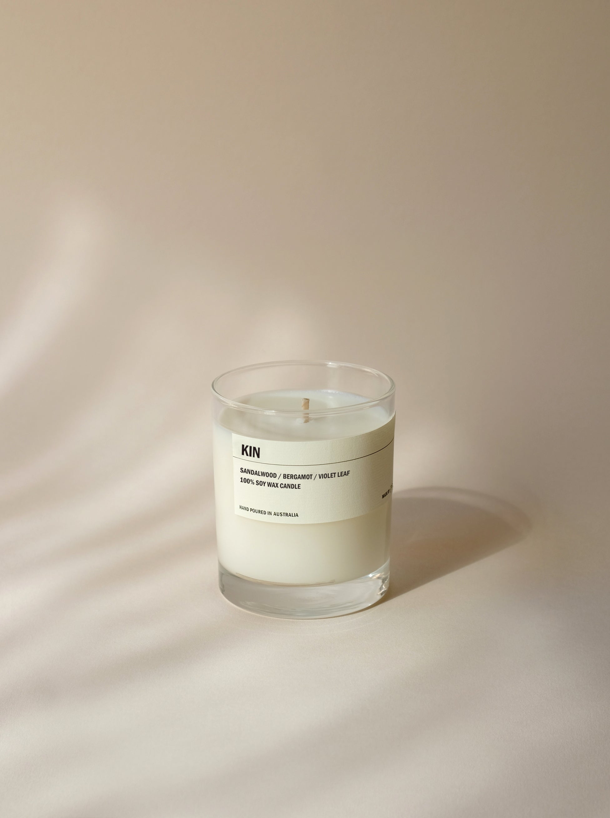 KIN: Sandalwood / Bergamot / Violet Leaf Clear Candle 300g – Posie